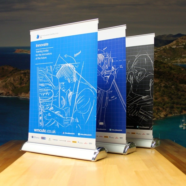 Emblem Desktop Roller Banner | KempCo Ltd